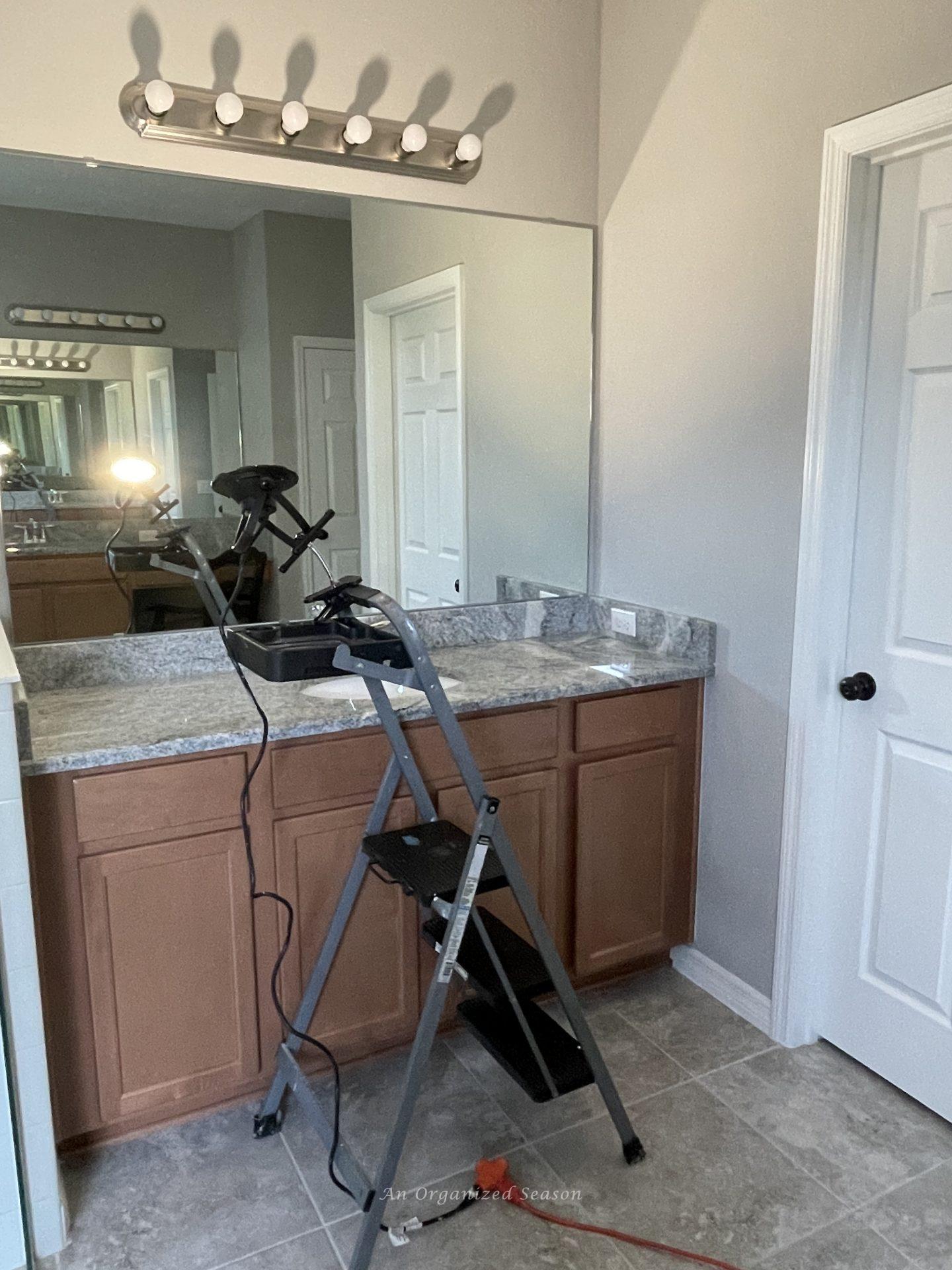 How to Replace your Bathroom Light Fixture - An Organized Season
