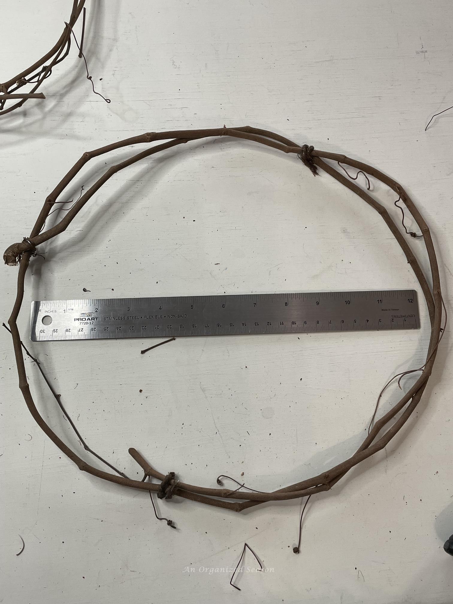 Easy DIY Topiary Frame from a Grapevine Wreath - An Organized Season