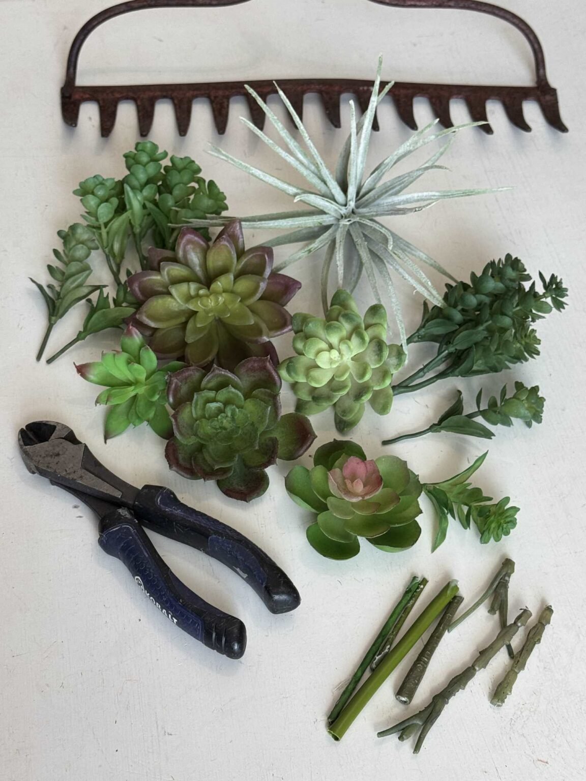 Unique Succulent Wall Art Made With an Upcycled Rake - An Organized Season